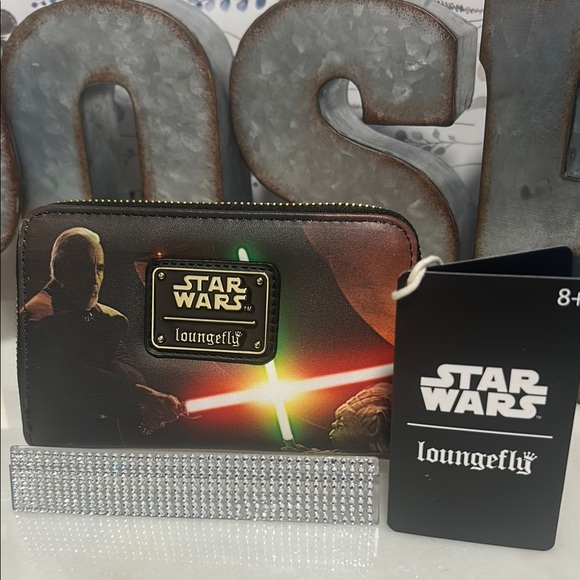 Loungefly | Bags | Loungefly Star Wars Wallet With Lightsaber Design ...